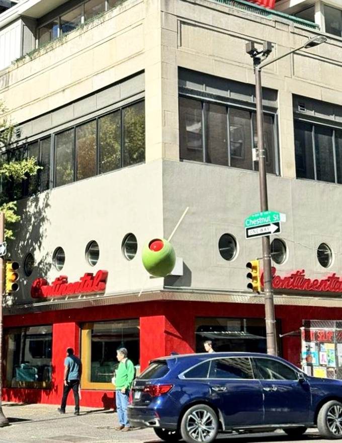 That giant olive with the red pimento isn't just cute—it's the Continental's playful wink to martini lovers and a Philly landmark in its own right.