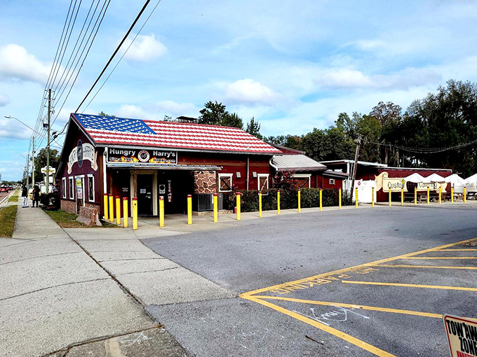From this angle, Hungry Harry's looks like a postcard from BBQ heaven. The flag roof promises patriotic levels of flavor that deliver every time.