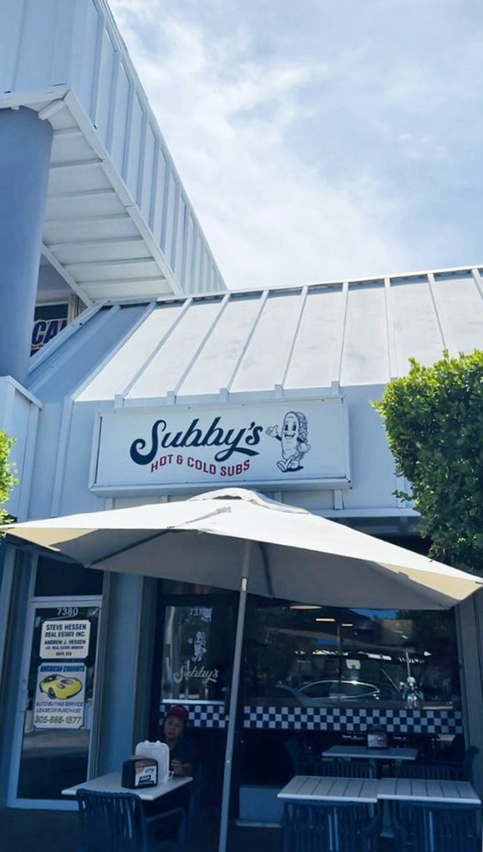 A slice of sandwich paradise under the Florida sky. That umbrella isn't just providing shade&mdash;it's marking a culinary treasure spot.