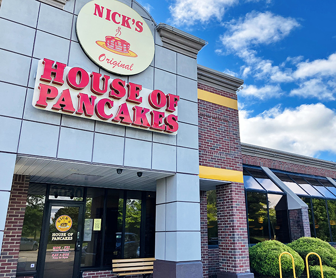 Nick's exterior on a perfect blue-sky day, standing ready to transform hungry arrivals into satisfied departures one pancake at a time.