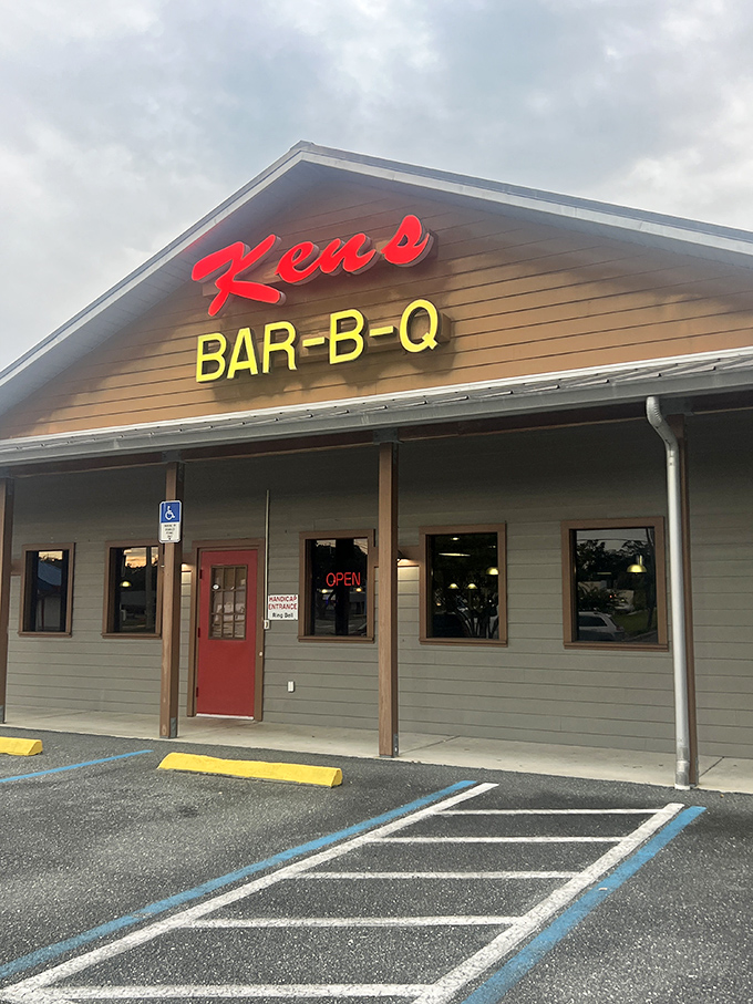 As dusk approaches, the sign glows brighter. Ken's stands ready for another evening of turning hungry visitors into lifelong evangelists.