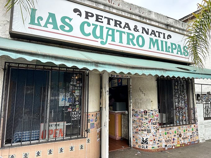 The sign says "Las Cuatro Milpas," but it might as well say "Home of Food That Will Ruin All Other Mexican Restaurants For You Forever."