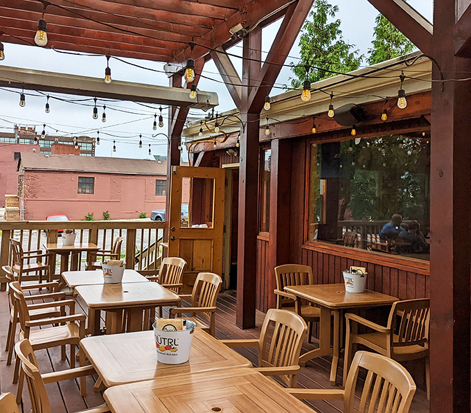 The outdoor deck &ndash; where fresh air, string lights, and wooden beams create the perfect setting for savoring burgers while soaking up Milwaukee's precious summer days.