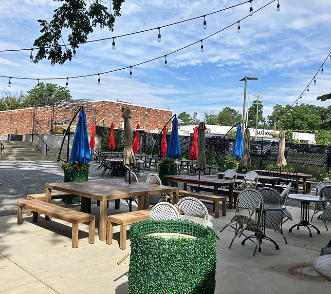 Outdoor dining that feels like stumbling upon a secret Italian courtyard. Those string lights aren't decoration&mdash;they're pizza ambiance infrastructure. 