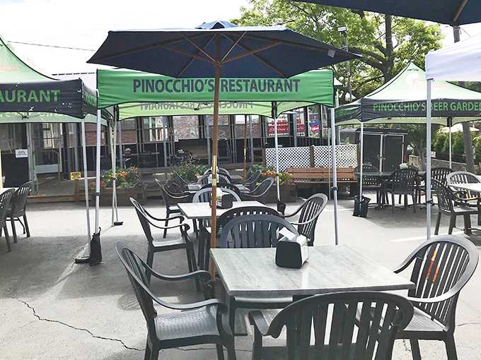 Outdoor seating where the Pennsylvania weather and pizza dreams come together under umbrellas of possibility.