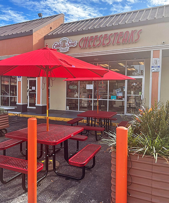 Those bright red umbrellas and tables &ndash; a splash of Philly spirit under Florida skies, inviting you to savor every bite in the sunshine.