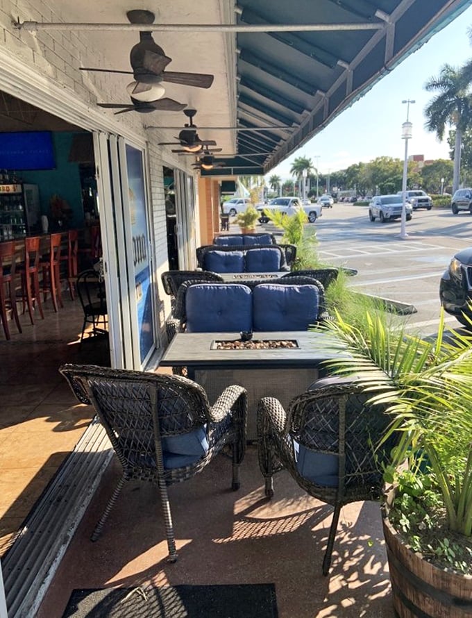 Outdoor seating where the Florida breeze carries conversations and the occasional whiff of smoked meat heaven.