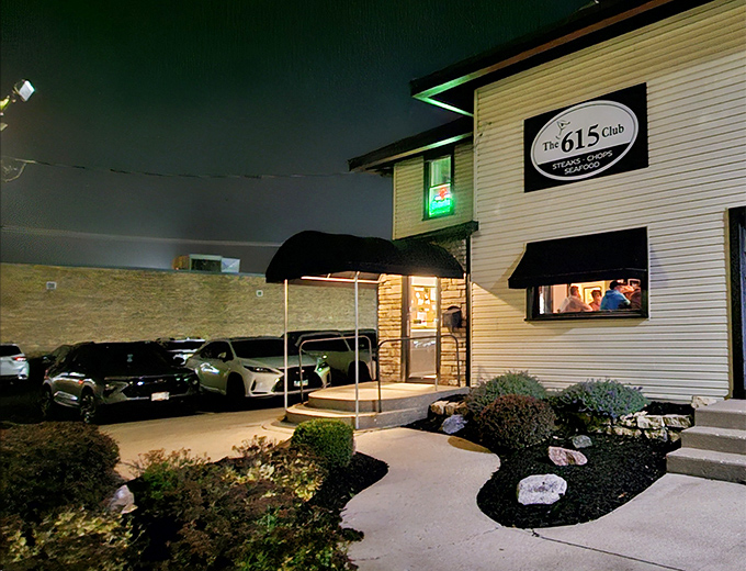 As evening falls, the warm glow from within transforms this unassuming building into a sanctuary of comfort food and Midwestern hospitality.