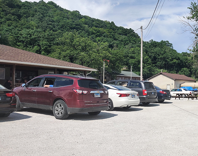 A parking lot full of vehicles with one thing in common &ndash; drivers who know that the best food often hides in the most unassuming places.