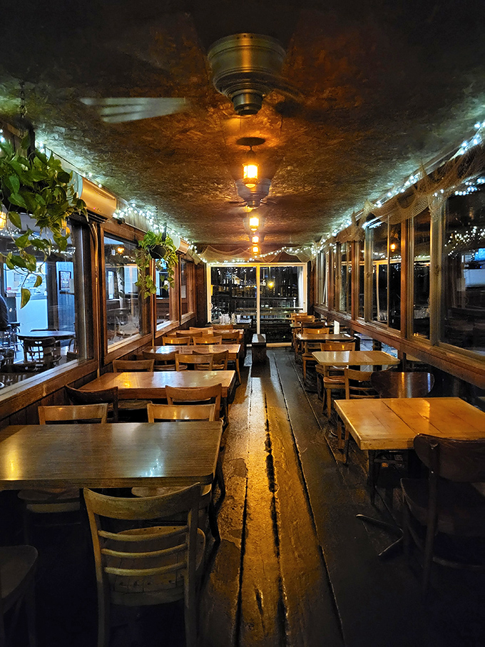 At night, the restaurant transforms into a twinkling, intimate space where every table feels like the best seat in the house. Pure floating magic.