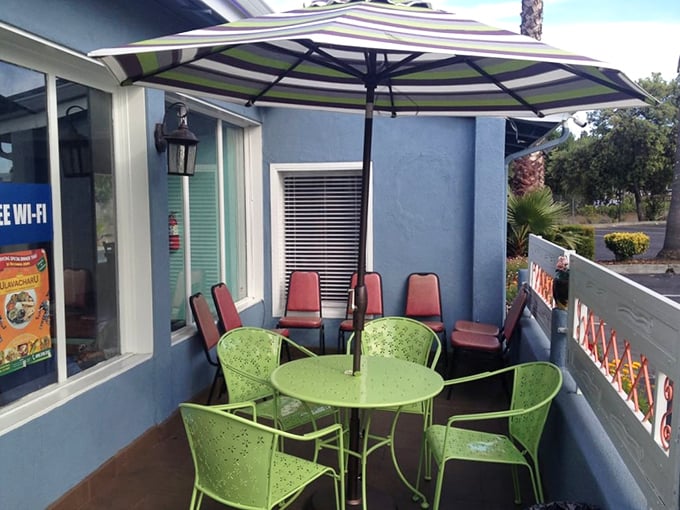 The patio at UlavacharU offers a moment of California sunshine between courses &ndash; those green chairs practically begging you to linger.