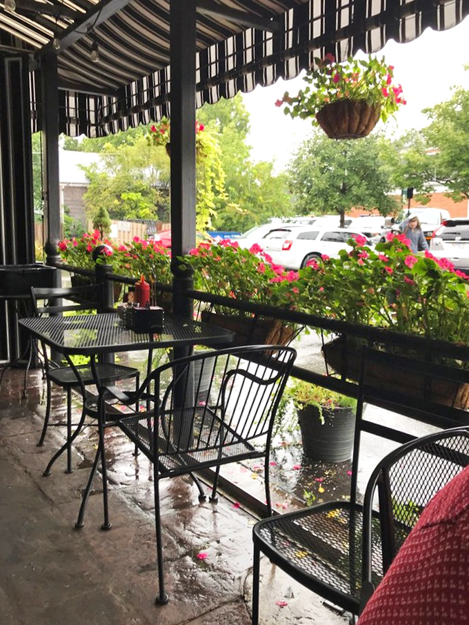 The flower-adorned patio offers a breath of fresh air and a front-row seat to Westerville life passing by.