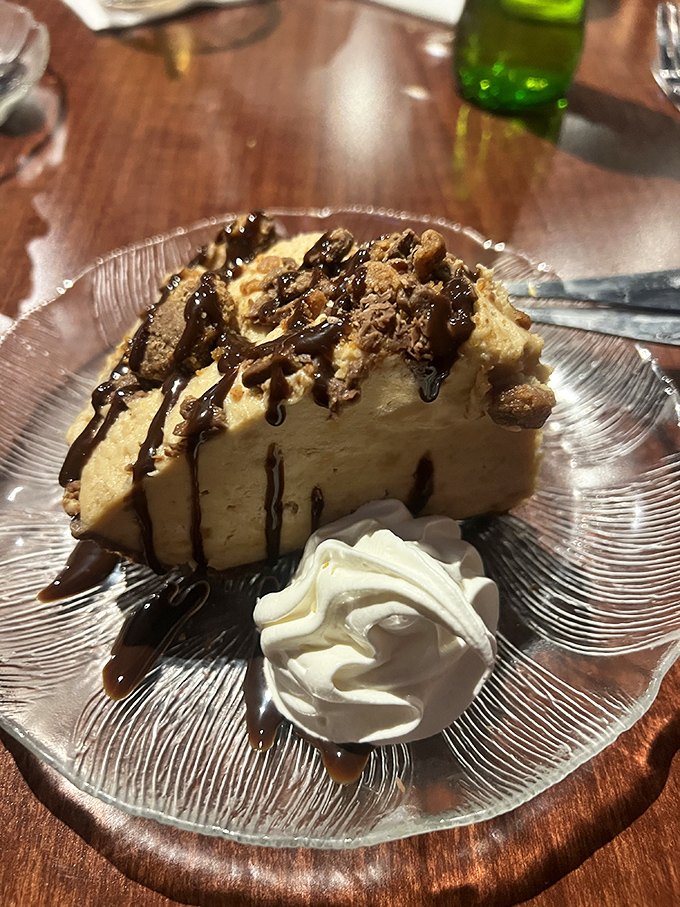Peanut butter pie that makes sharing impossible &ndash; topped with chocolate drizzle that should be considered a work of art.