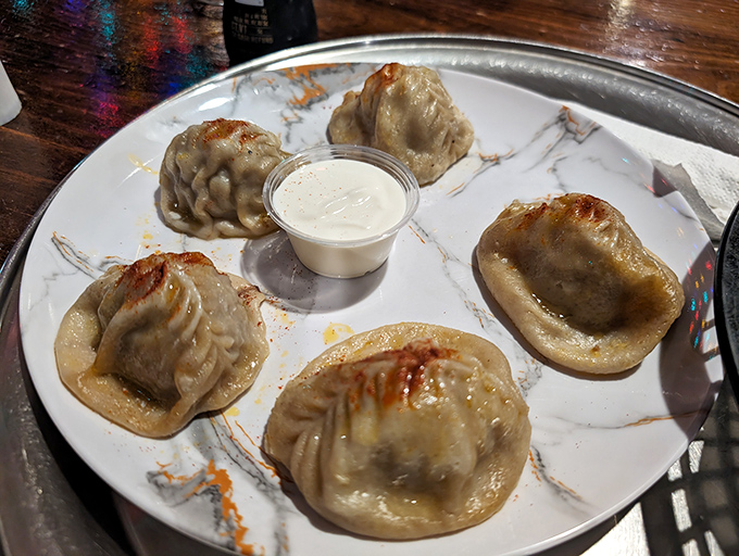 Dumplings that make you understand why entire cultures build celebrations around them. Each plump pocket delivers a perfect bite with a side of culinary history.