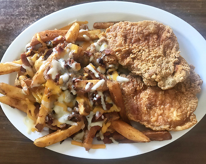 Country-fried perfection meets loaded fries&mdash;a plate that says "diet tomorrow" and "happiness today" in the most delicious way possible.