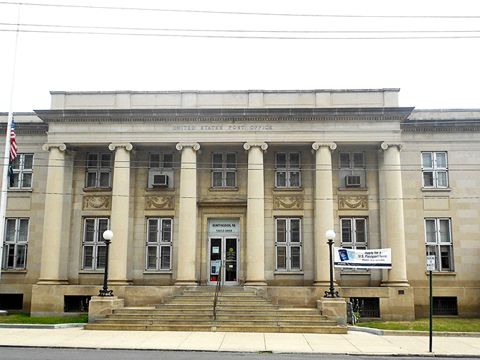 This grand post office in Huntingdon greets visitors with stately columns and timeless architecture adding historic charm to the town&rsquo;s center.