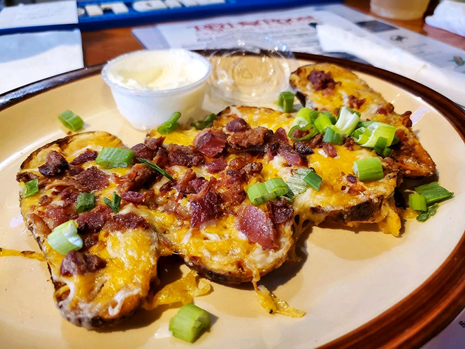 Potato skins that have achieved the impossible trifecta: crispy, gooey, and bacon-blessed. Diet plans come here to die happy deaths.
