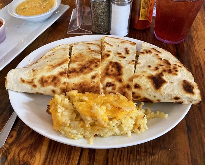 A quesadilla that bridges breakfast and lunch, accompanied by hash browns that achieved the perfect golden-to-crisp ratio.