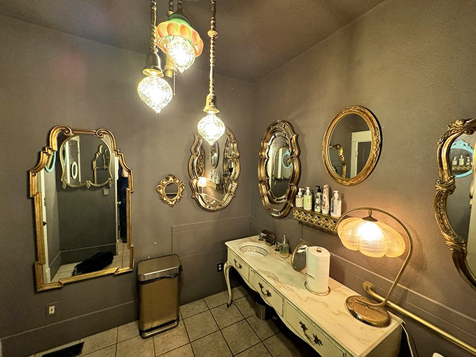 Even the restroom continues the vintage charm offensive with ornate mirrors that make washing hands feel like a glamorous 1920s affair.