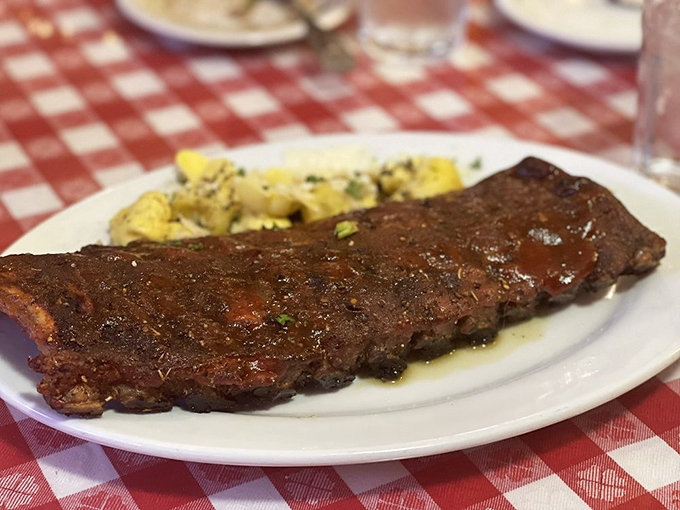 These ribs aren't just falling off the bone&mdash;they're practically filing for independence, with a sauce that should be bottled and sold as liquid gold.