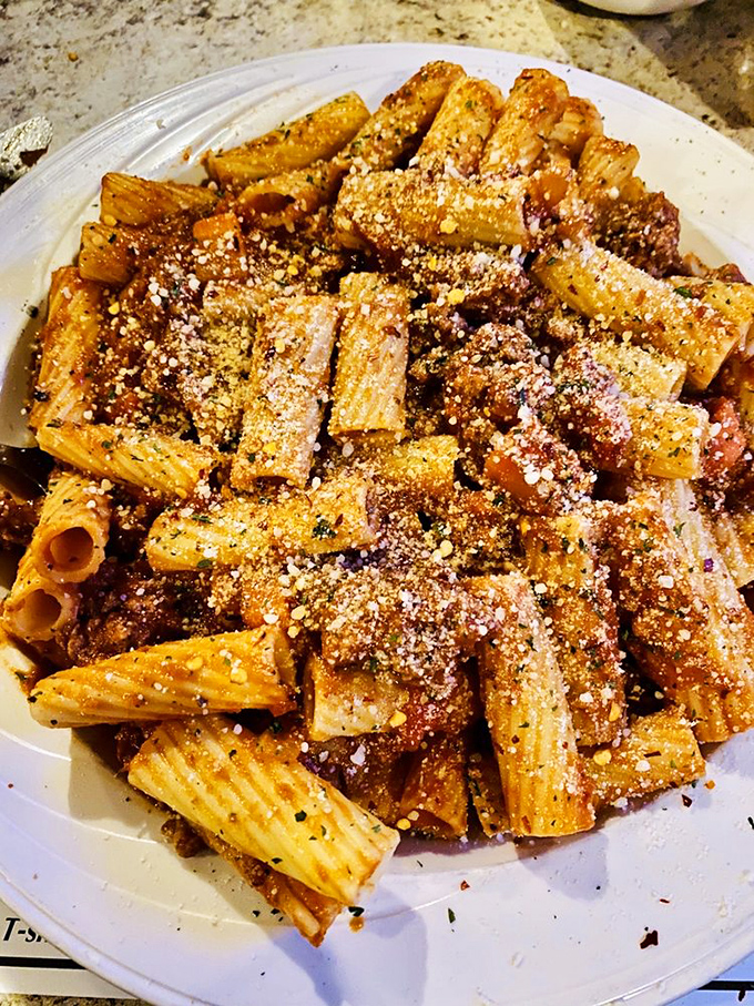 Rigatoni that doesn't just hold the sauce&mdash;it embraces it like a long-lost relative. That generous dusting of cheese is the edible equivalent of a warm Italian hug.