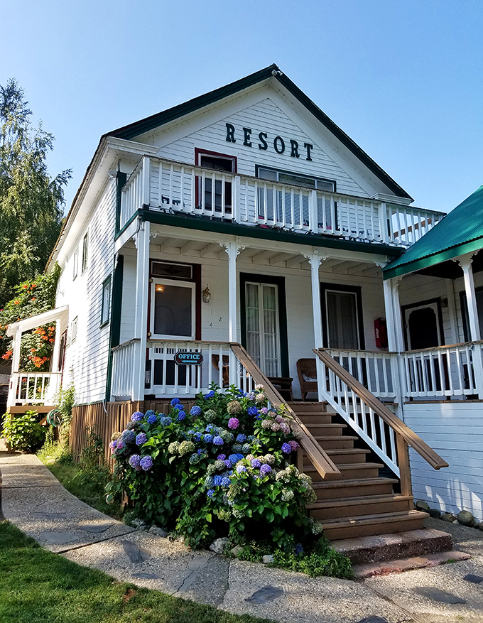 The River Inn & Resort welcomes weary travelers with Victorian charm and hydrangeas that somehow manage to outshine even the mountain backdrop.