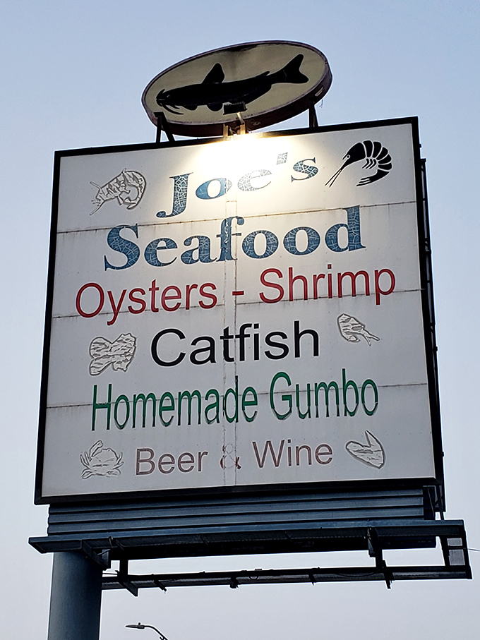 A roadside beacon of culinary promise&mdash;Joe's sign listing seafood treasures like a delicious table of contents for your next meal.