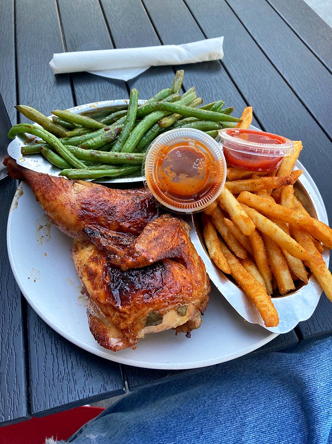 This isn't just chicken&mdash;it's poultry perfection. The skin crackles with flavor while those green beans and fries stand by as worthy companions.
