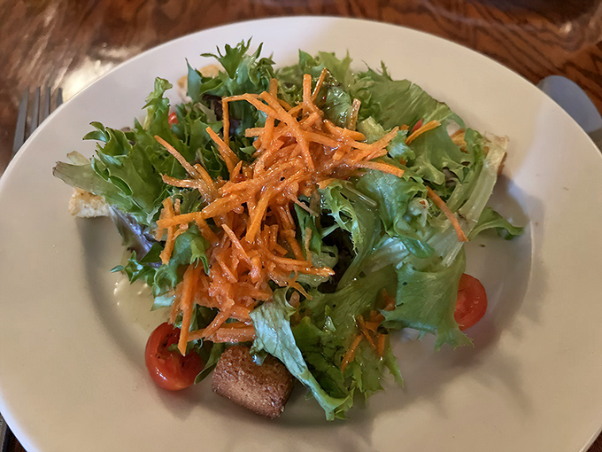 Even the house salad gets special treatment, with crisp greens and matchstick carrots that remind you vegetables can be more than an obligation.