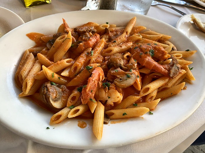Penne pasta with seafood that makes you wonder why you'd ever order anything else &ndash; a masterclass in Italian simplicity.