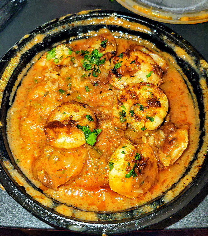 Proof that Cockeye's talents extend beyond traditional barbecue. These shrimp swim in a sauce worth bottling and drinking.