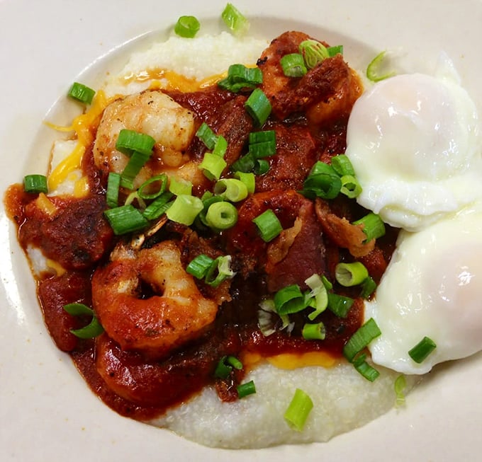 Shrimp and grits that would make Charleston jealous, topped with scallions and eggs that transform breakfast into an event worth waking up for.
