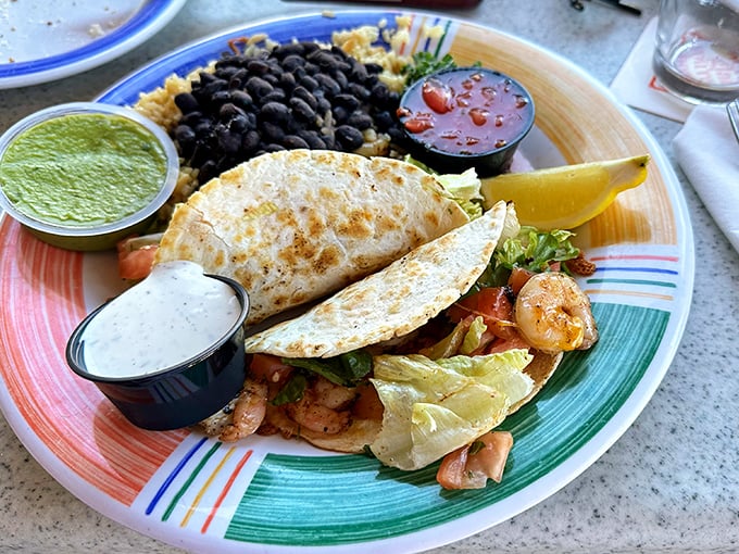 Shrimp tacos that bring together the best of land and sea &ndash; a fiesta of flavors that would make both coasts of Mexico proud.