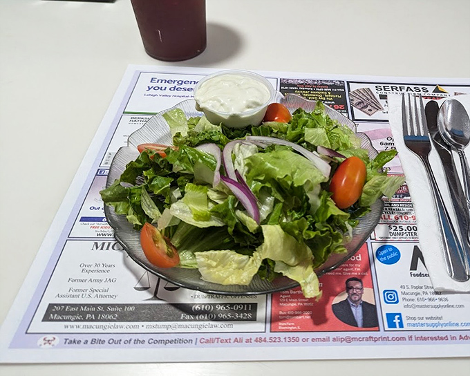 Even the side salad gets respect here &ndash; crisp greens, fresh vegetables, and a dressing on the side because they understand some decisions are personal.