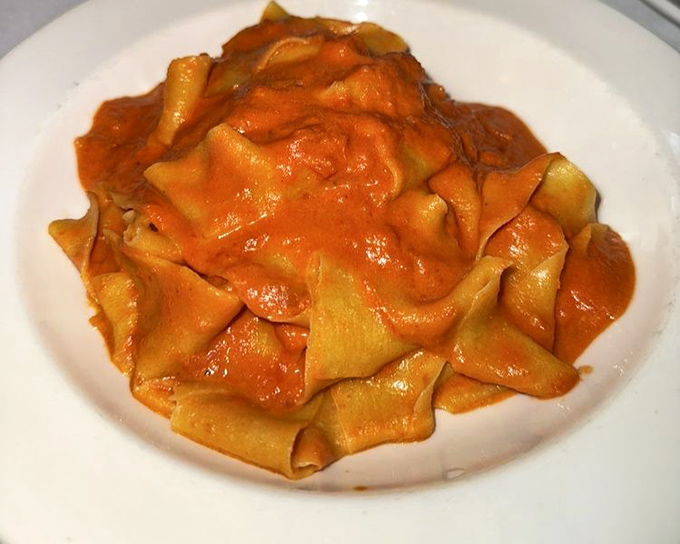 Pasta with red sauce so vibrant it could stop traffic&mdash;and so delicious you'll be plotting your return before the plate is empty.