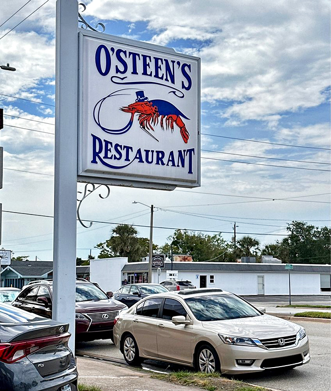 The iconic O'Steen's sign, featuring their dapper shrimp mascot in a top hat, stands as a beacon for seafood lovers. No fancy marketing needed when the food speaks for itself.