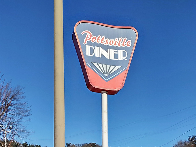 That vintage sign against the blue Pennsylvania sky is like a beacon for the breakfast-obsessed. The Pottsville Diner logo promises retro delights await.