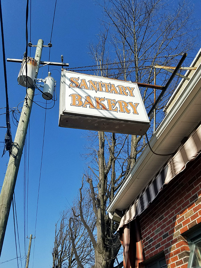 Against a brilliant blue sky, the Sanitary Bakery sign serves as a beacon for carb-seekers and sweet-tooths throughout northeastern Pennsylvania.