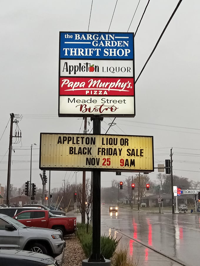 The neighborhood sign announces your arrival at the intersection of Thrift and Delight, with pizza and liquor conveniently nearby.