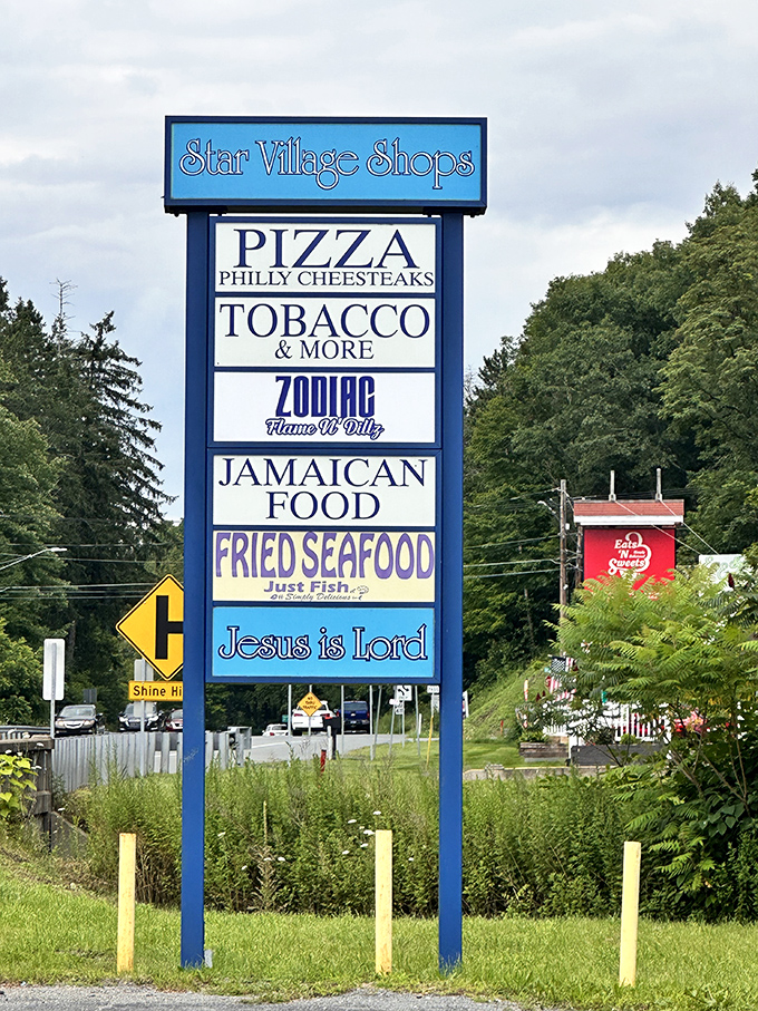 Even the neighborhood sign knows what's important in life: pizza first, everything else second. Priorities perfectly aligned.