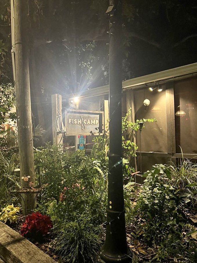 At night, Owen's glows like a beacon for seafood lovers, promising cold drinks and warm hospitality among the palms.