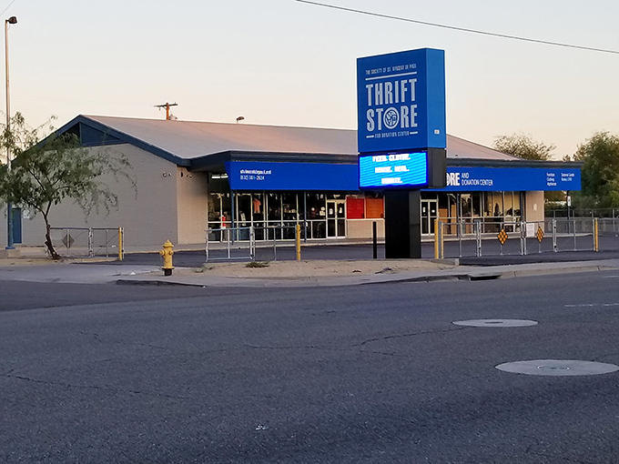 As dusk falls, the blue glow of the storefront serves as a beacon for bargain hunters. Tomorrow brings a whole new inventory of possibilities.