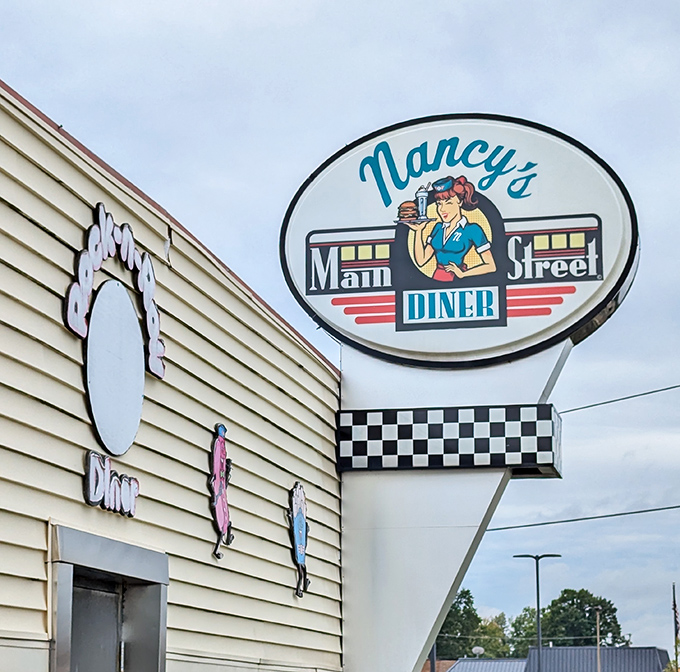 Nancy's iconic sign stands as a beacon to hungry travelers, promising the kind of meal that makes you plan your next visit before finishing the first.
