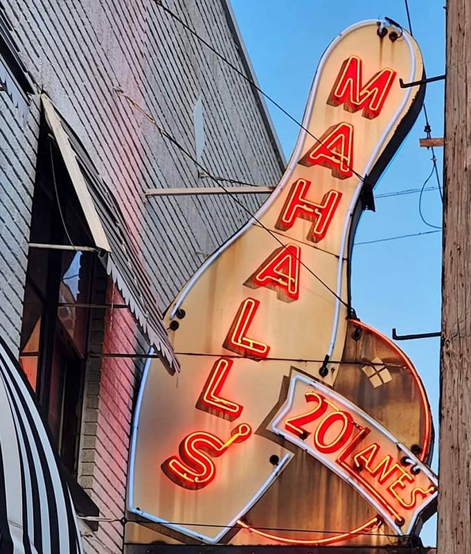 The iconic bowling pin sign glows like a beacon in the night, calling to both serious bowlers and those just looking for a uniquely Ohio good time.