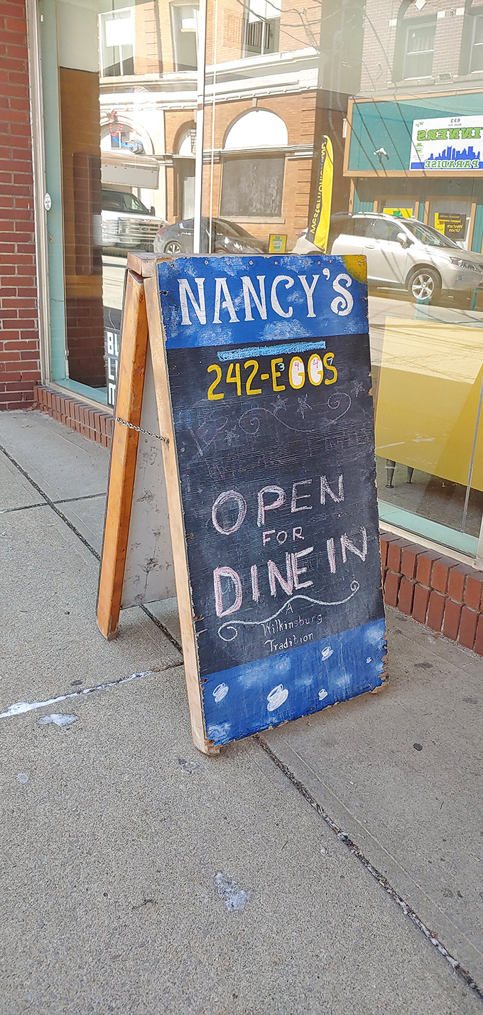 A sidewalk sign that doesn't lie &ndash; this place truly embodies the finest Wilkinsburg dining tradition.