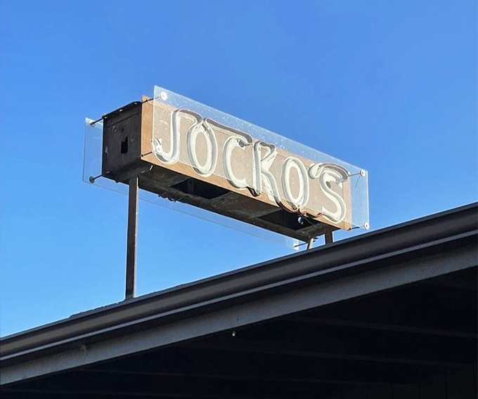A sign as straightforward as the food it advertises. In a world of flashy neon and digital displays, there's something reassuring about simple illuminated letters.