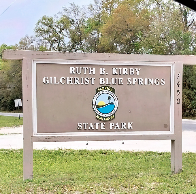 The entrance sign promises adventure in bold letters. Like the doorway to Narnia, but with more alligator warnings and better swimming.