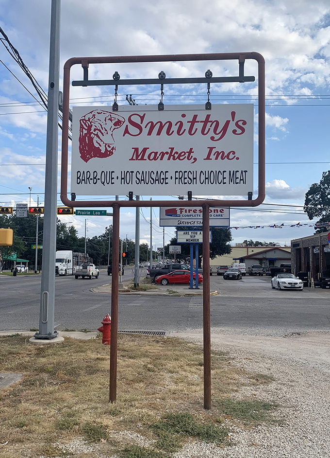That roadside sign promises barbecue, hot sausage, and fresh choice meat &ndash; truth in advertising.