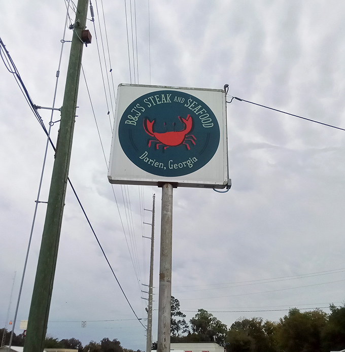 The sign that seafood pilgrims search for. That red crab isn't just a logo&mdash;it's a beacon guiding hungry travelers to coastal nirvana.