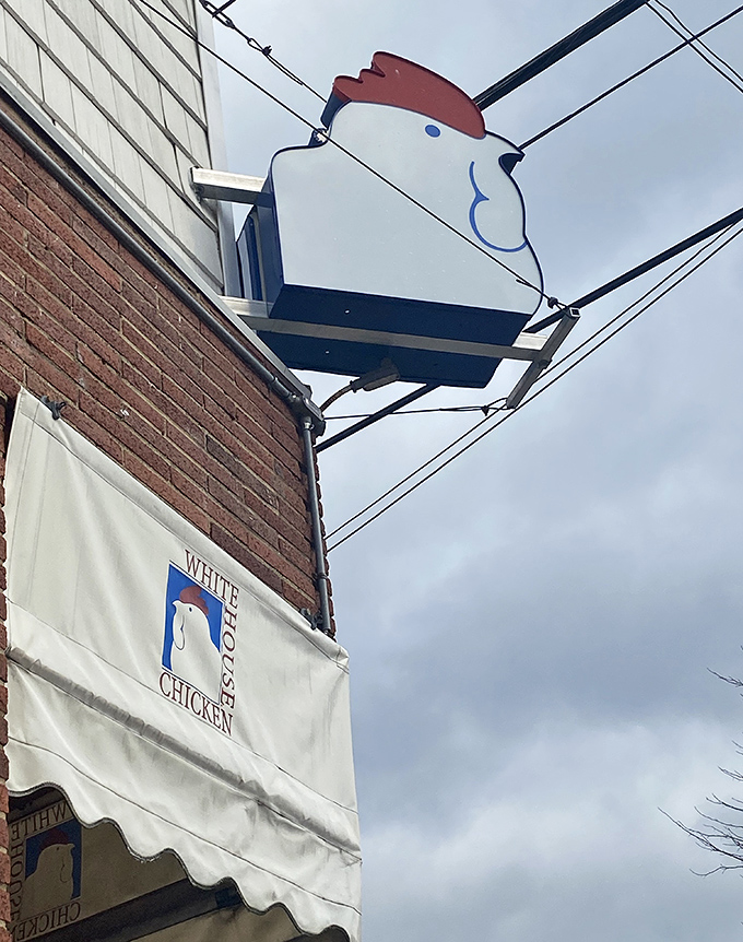 That rooster sign isn't just advertising&mdash;it's a beacon of hope for hungry travelers seeking the holy grail of Barberton-style fried chicken.